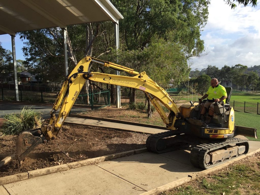 Ideal-foundations-excavator-clearing-school-gardens - Ideal Corp